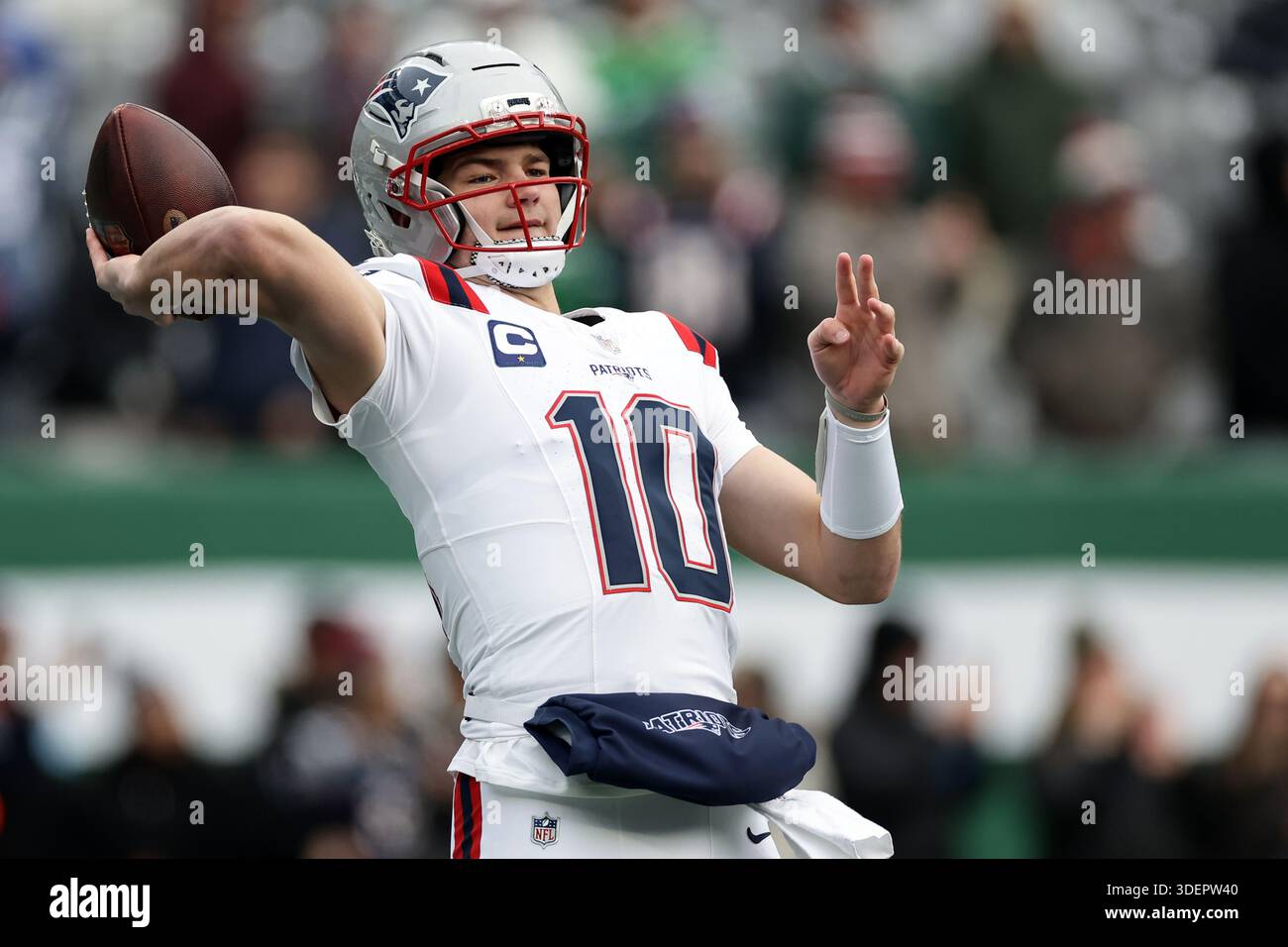 New England Patriots quarterback Drake Maye (10) warms up before an NFL ...