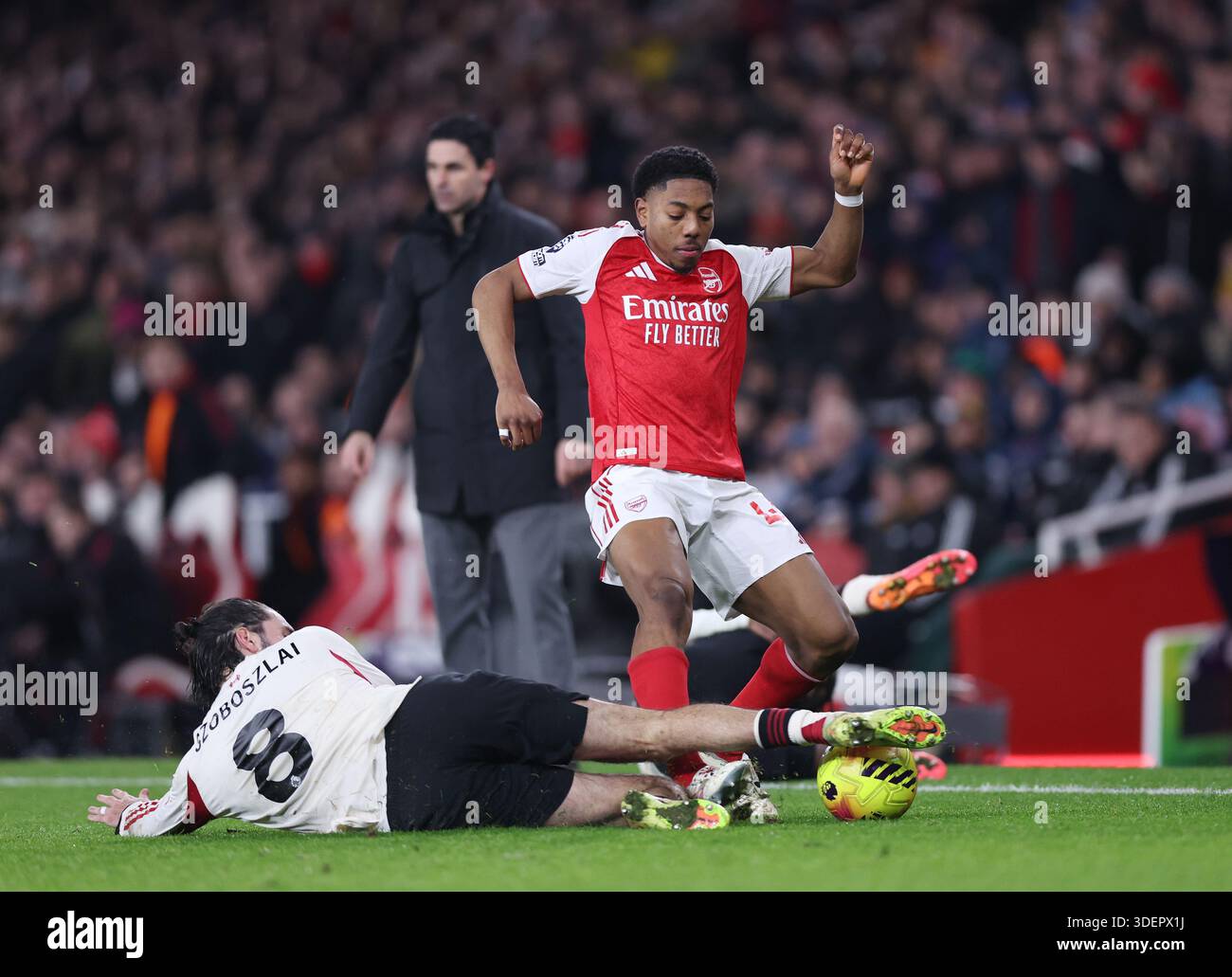 London, UK. 8th Jan, 2026. Myles Lewis-Skelly of Arsenal tackled by ...