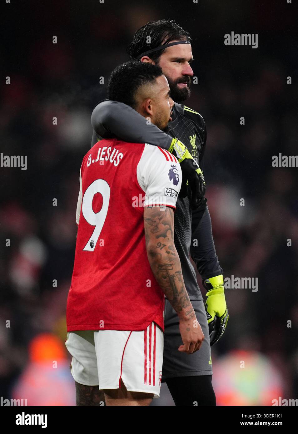 Arsenal's Gabriel Jesus and Liverpool goalkeeper Alisson Becker after ...