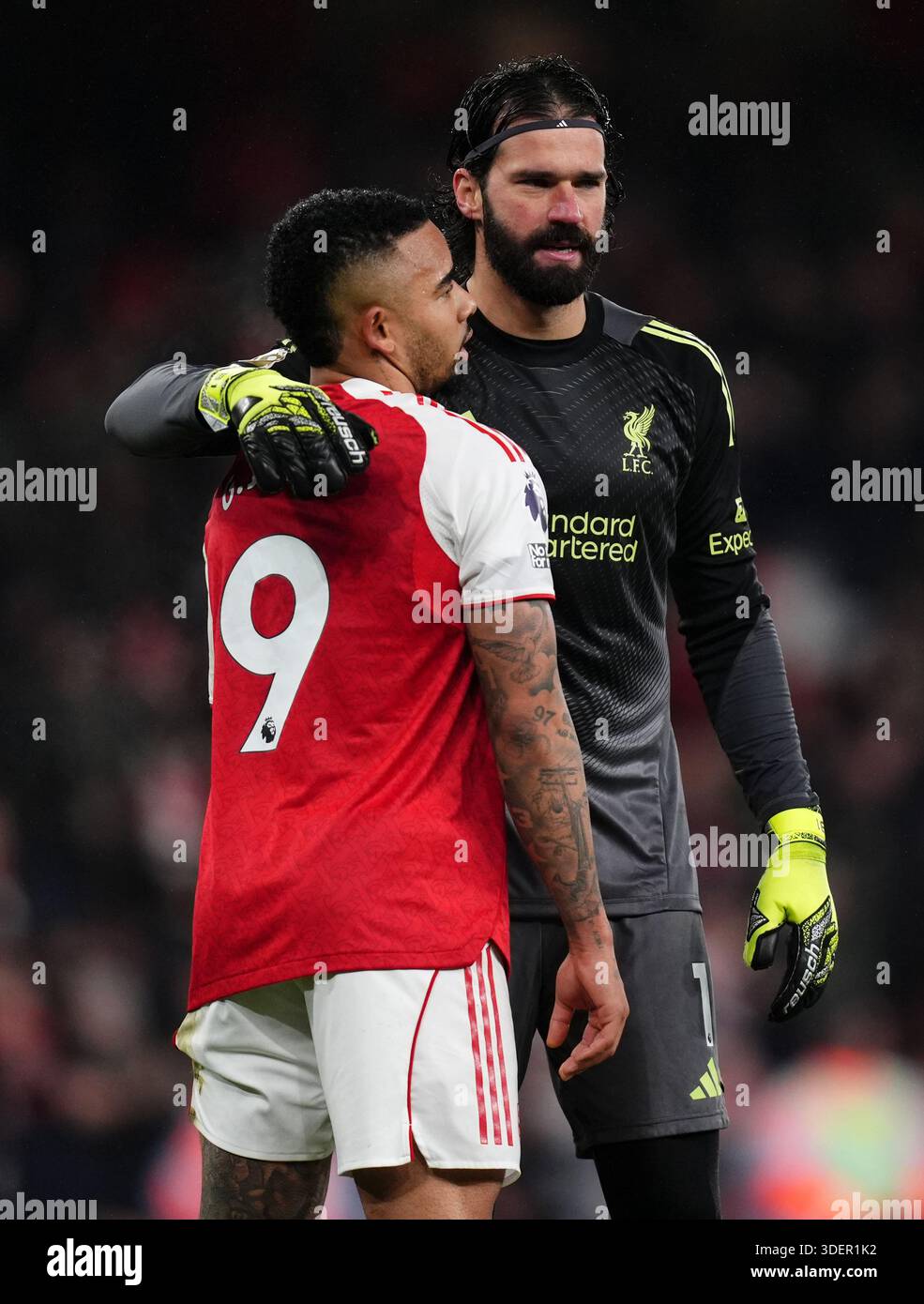 Arsenal's Gabriel Jesus and Liverpool goalkeeper Alisson Becker after ...
