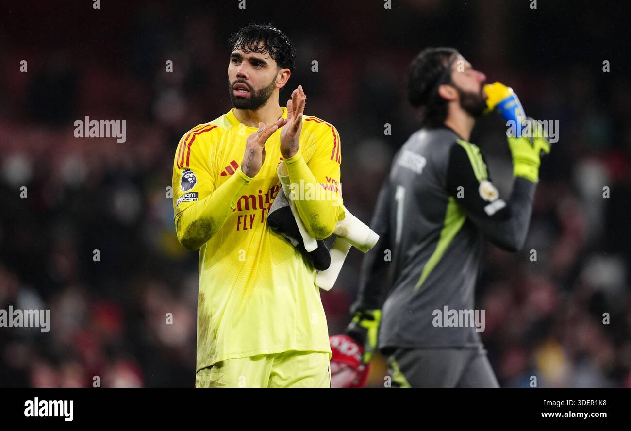 Arsenal goalkeeper David Raya (left) and Liverpool goalkeeper Alisson ...