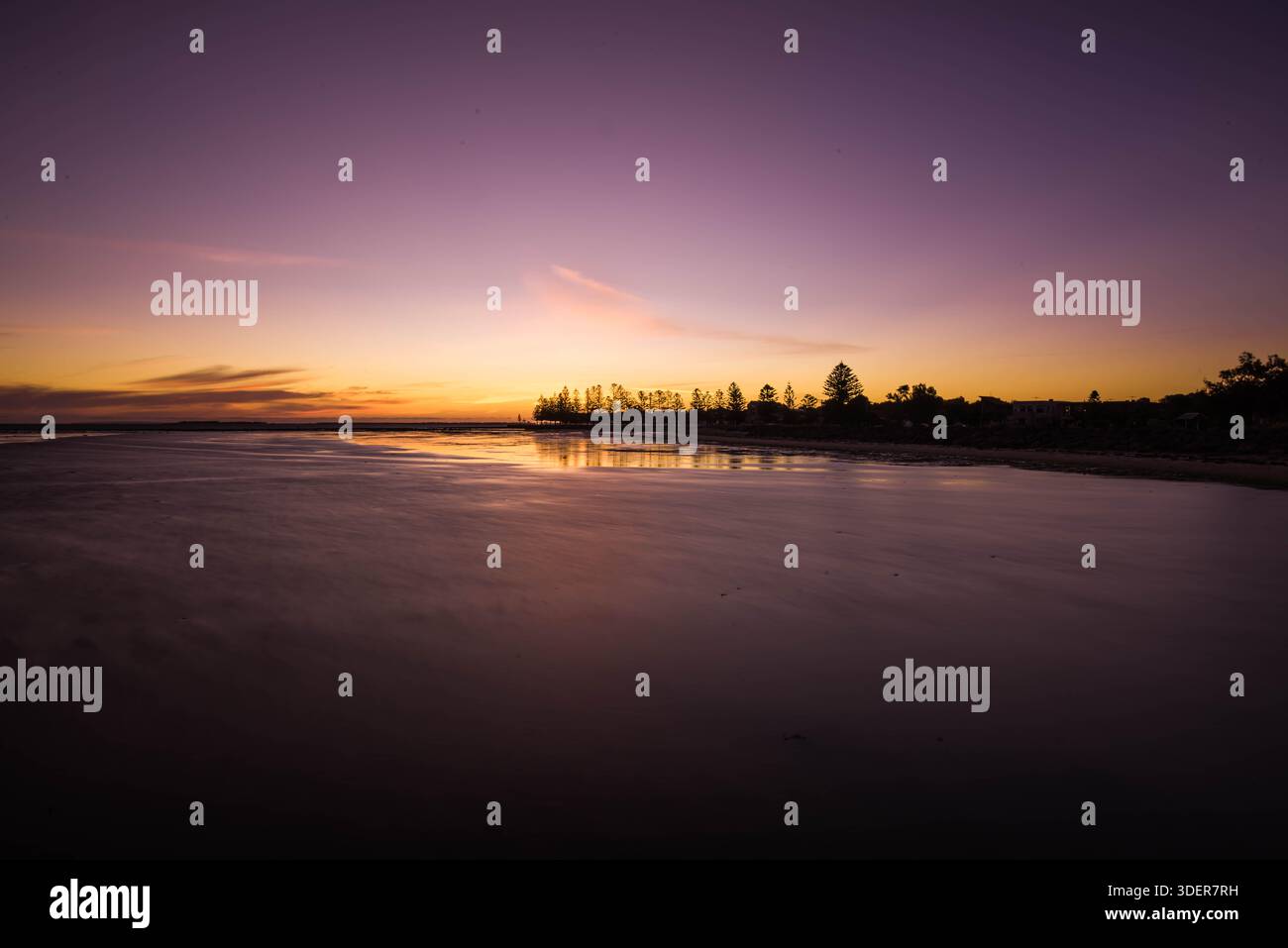 An attractive beautiful view of the sun rising at Altona Beach Pier in ...