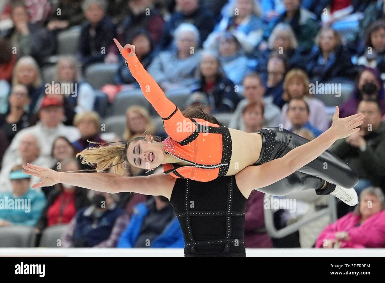 Katarina Wolfkostin and Dimitry Tsarevski compete during the ice dance ...
