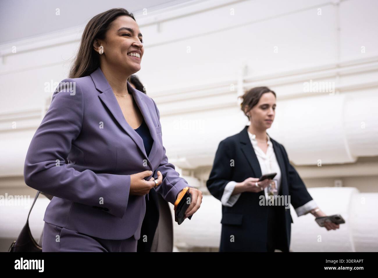Rep. Alexandria Ocasio-Cortez (D-N.Y.) walks to a vote at the U.S ...