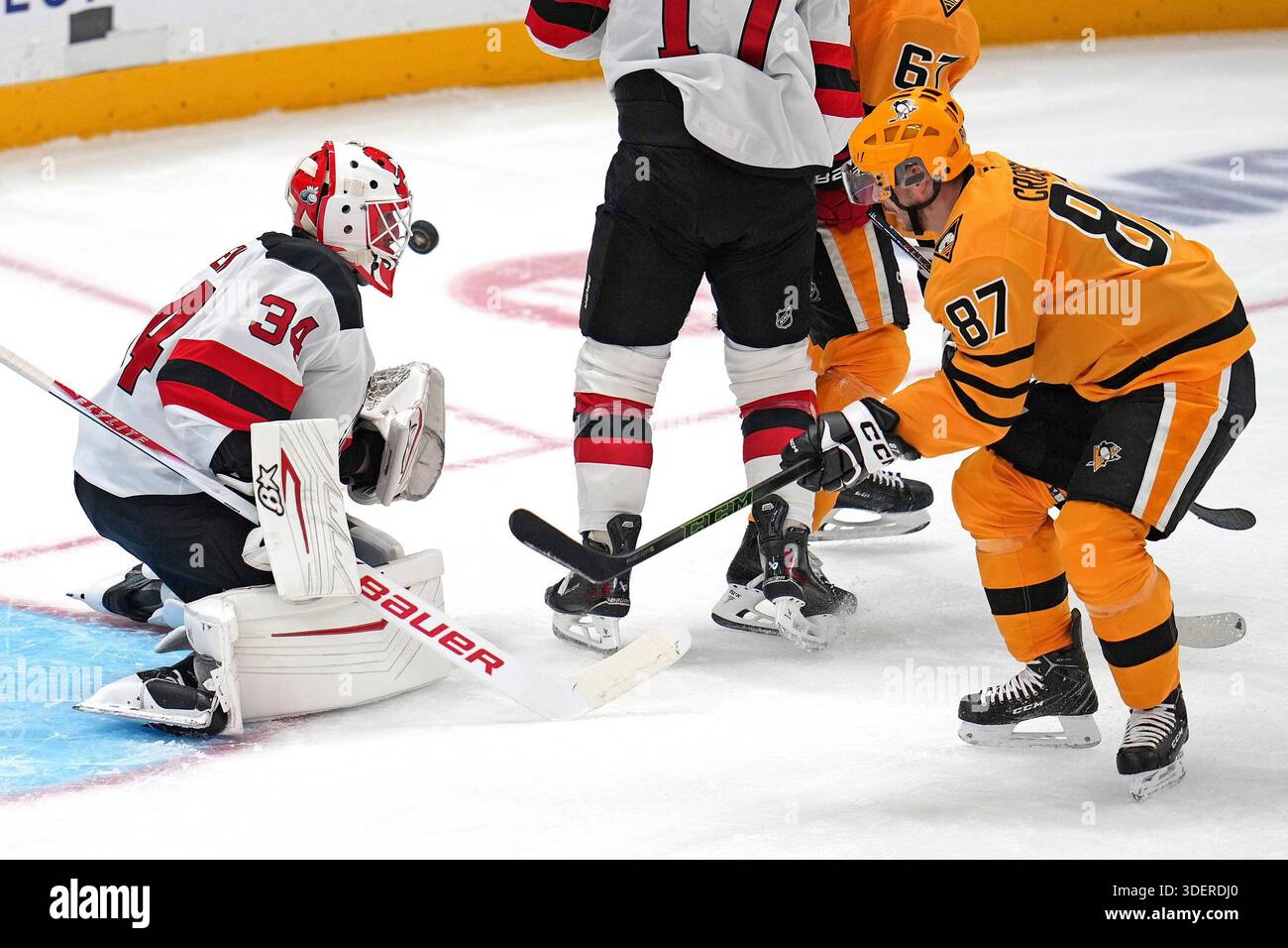 New Jersey Devils goaltender Jake Allen (34) blocks a shot by ...