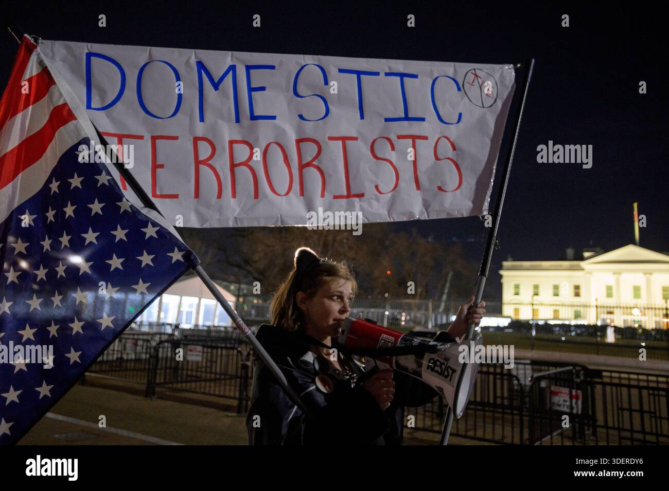 Heather Griffis joins others to protest U.S. Immigration and Customs ...