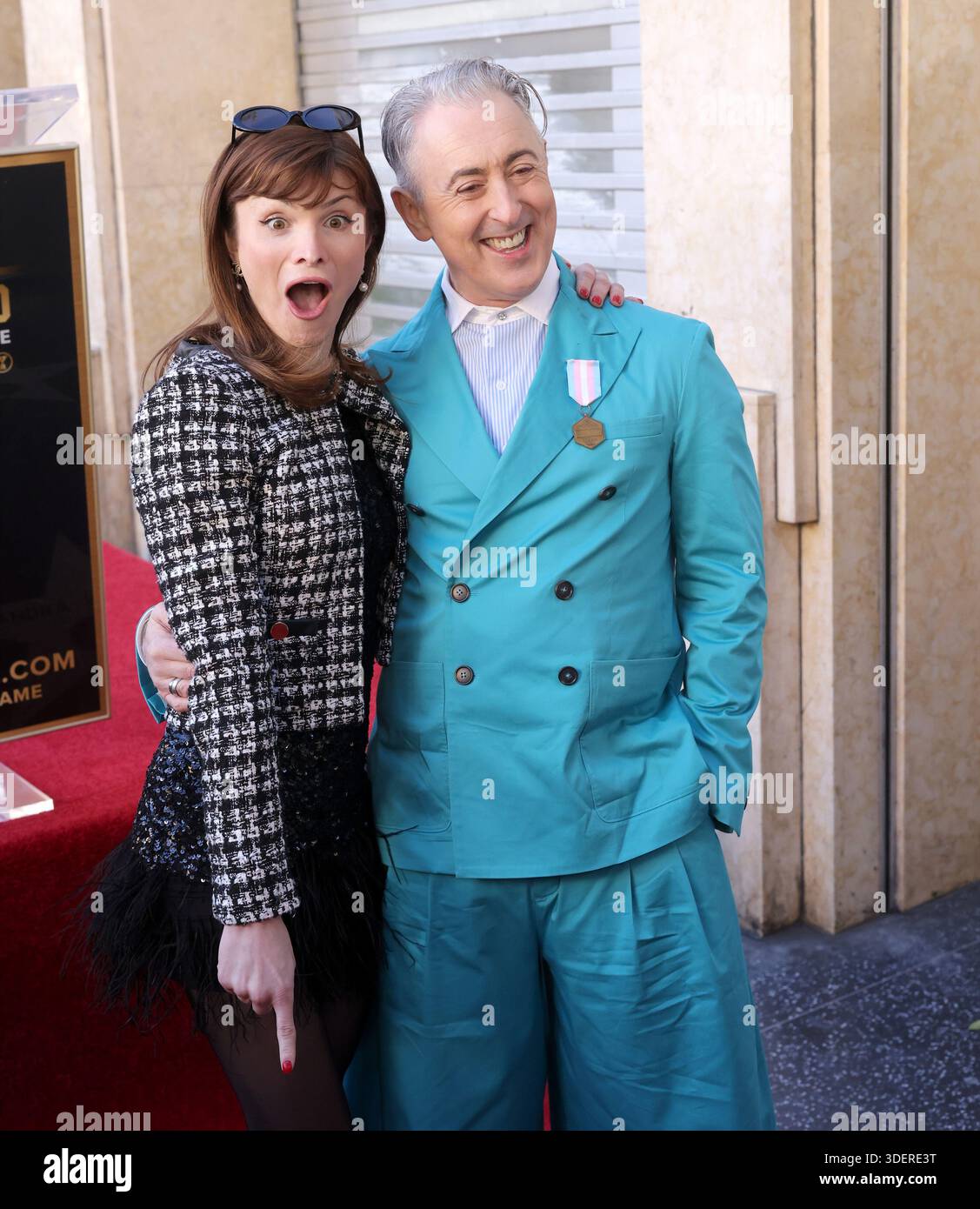 Dylan Mulvaney and Alan Cumming attend an unveiling ceremony honoring ...