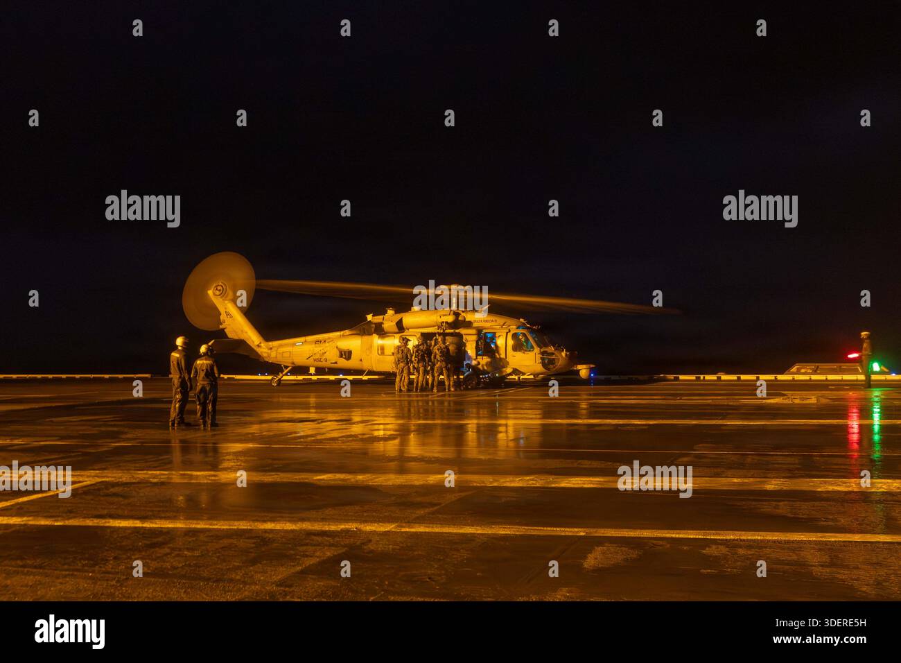 U.S. Coast Guard and Law Enforcement Tactical Team members, Sailors ...