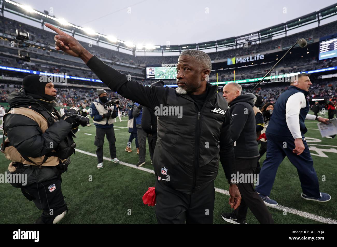 New York Jets head coach Aaron Glenn gestures after shaking hands with ...