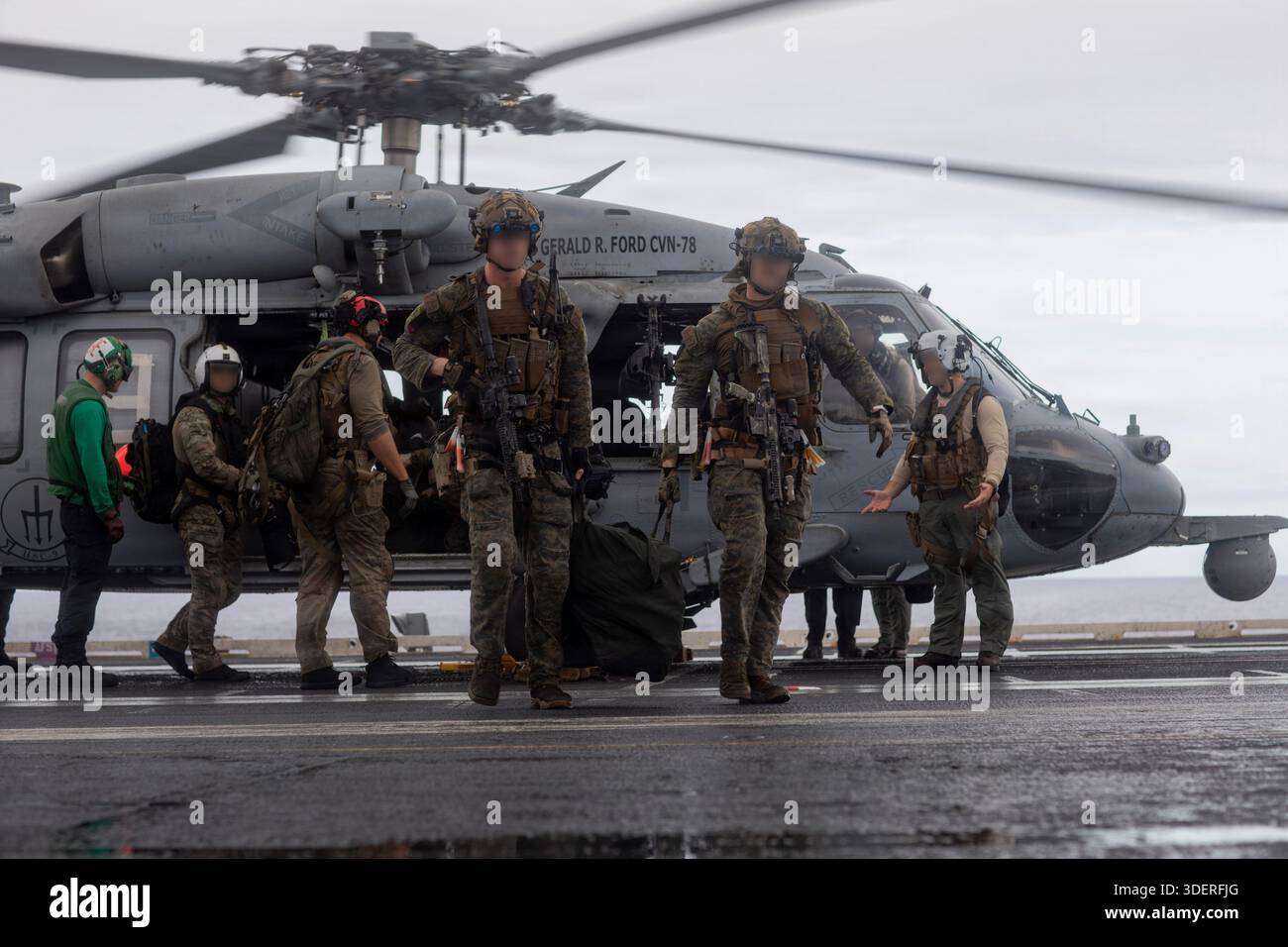 U.S. Coast Guard and Law Enforcement Tactical Team members, Sailors ...