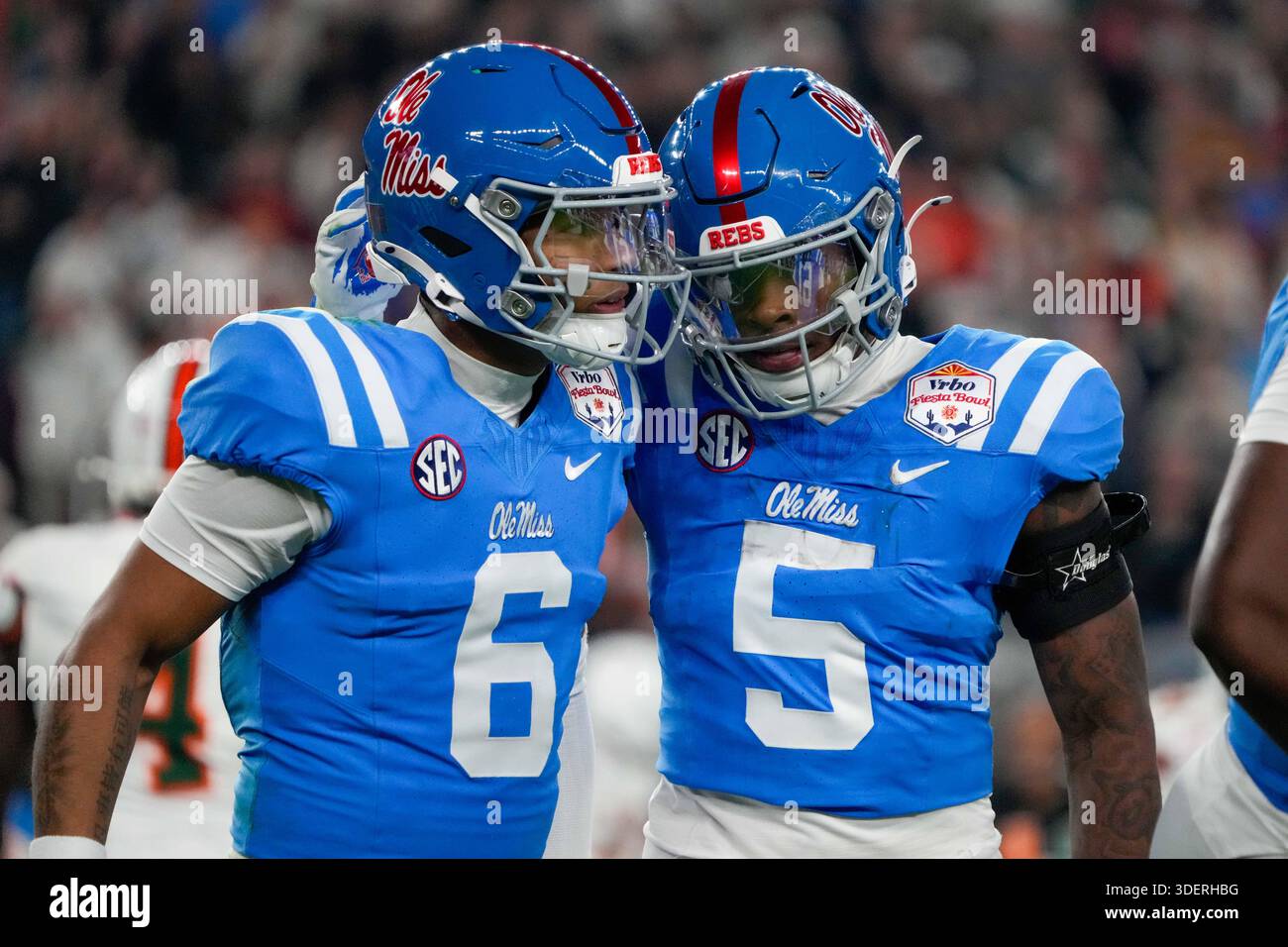 Ole Miss Rebels quarterback Trinidad Chambliss (6) and running back ...