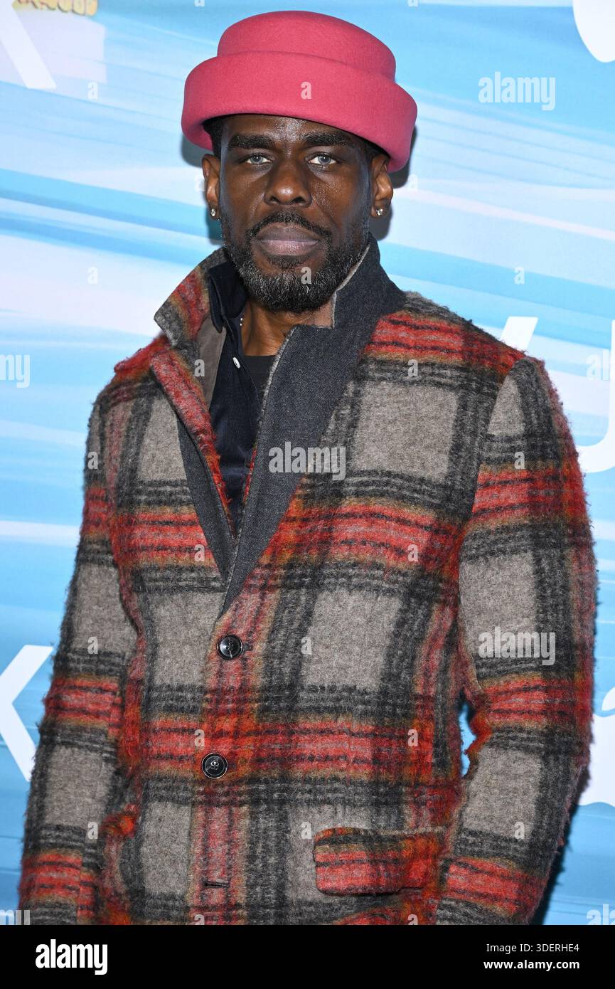 Mustafa Shakir walking the red-carpet event for season two of Apple TV ...