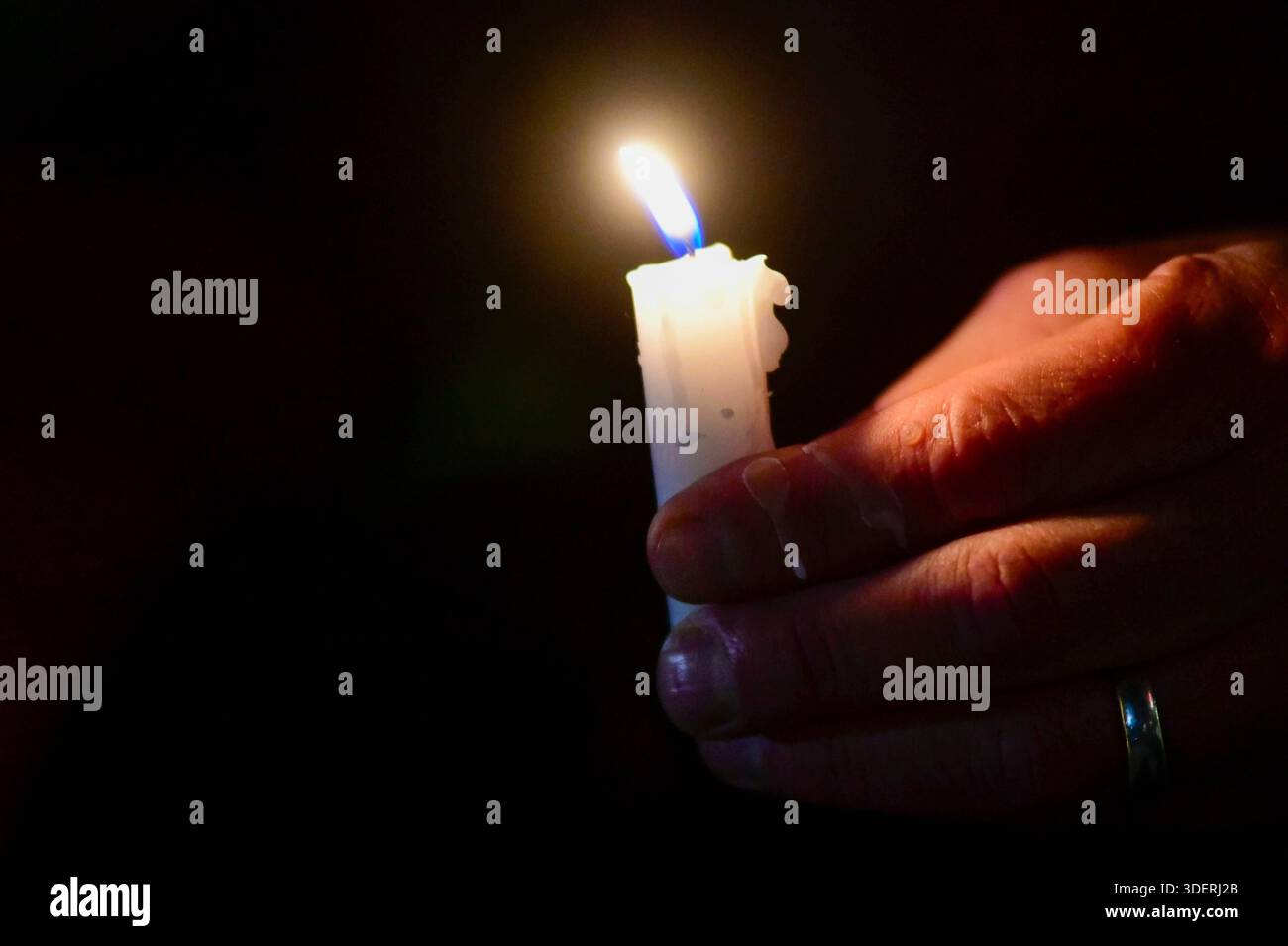 People gather at Pliny Park in Brattleboro, Vt., for a candlelight ...