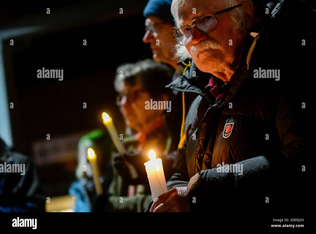 People gather at Pliny Park in Brattleboro, Vt., for a candlelight ...