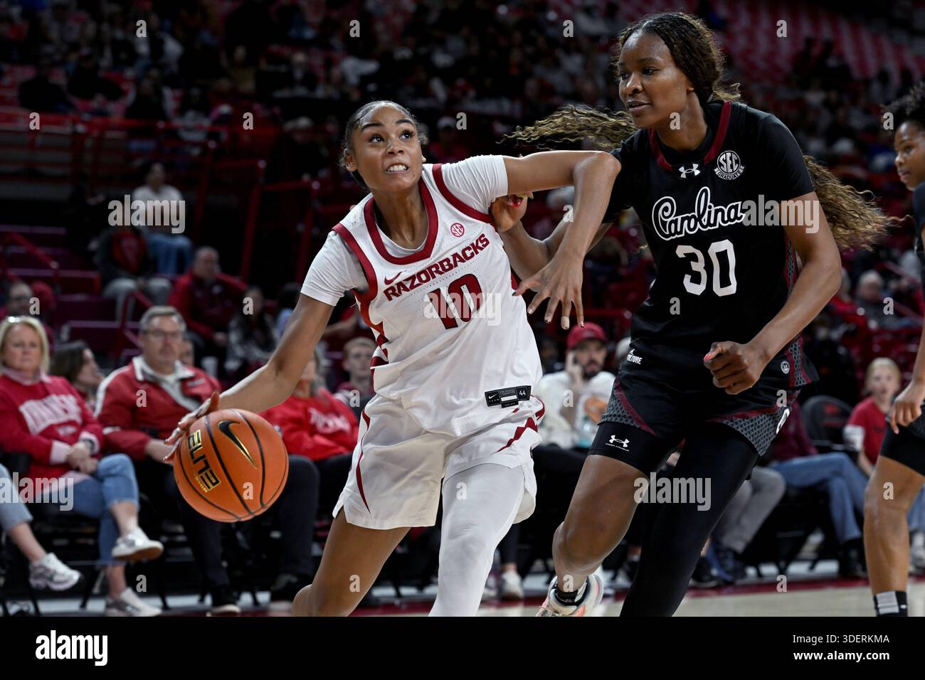 Arkansas guard Taleyah Jones (10) tries to drive past South Carolina ...