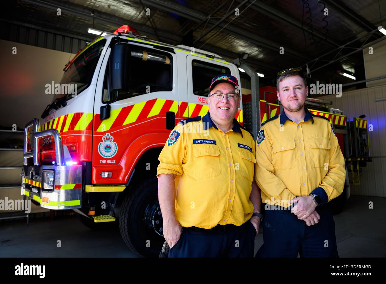 Rural Fire Service (RFS) volunteers Brett Wheeler (left), and Shaun ...