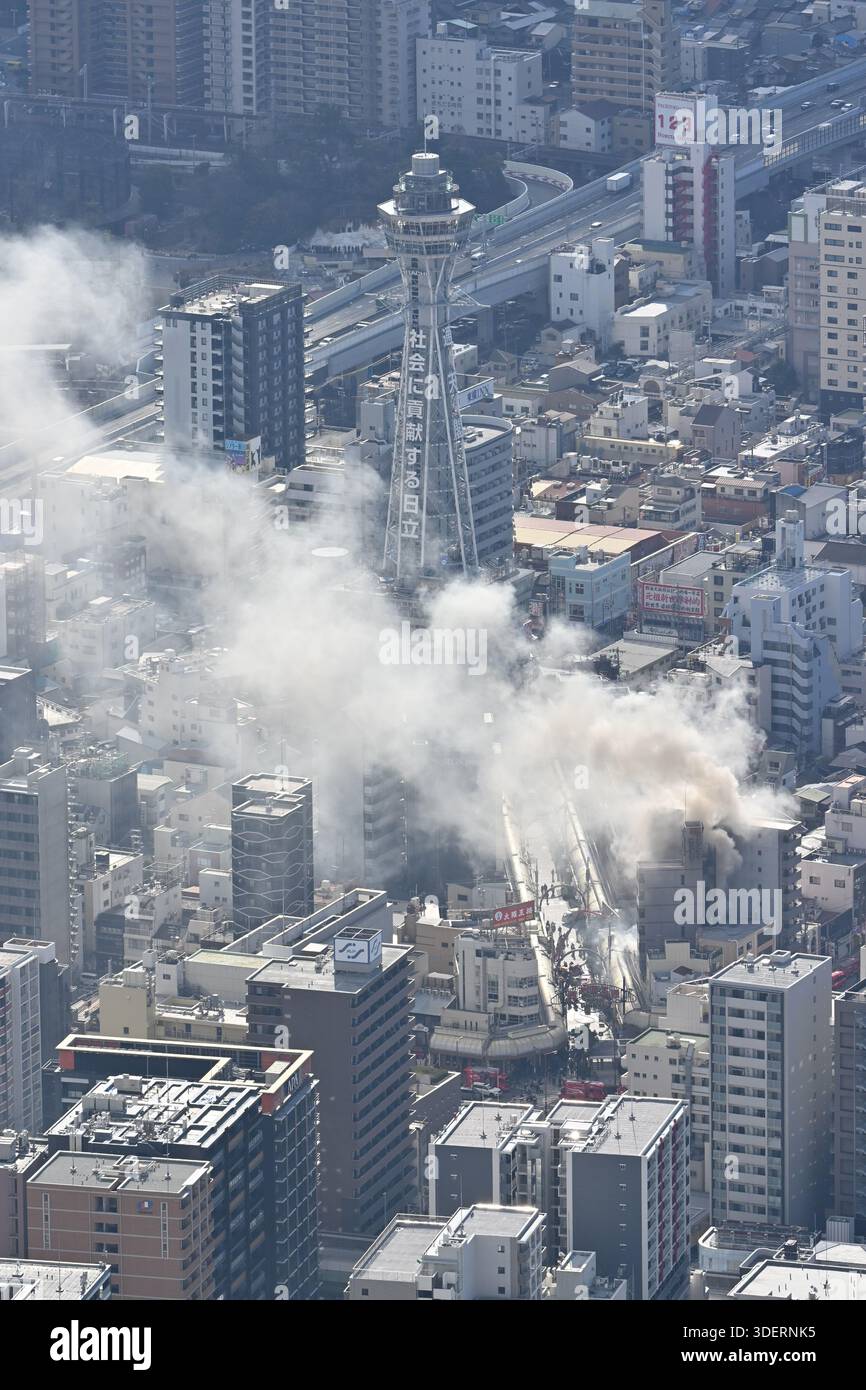 An aerial photo shows a fire scene billowing white smoke in Naniwa Ward ...