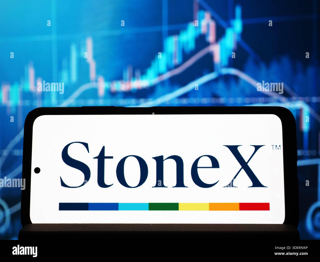 In this photo illustration, a StoneX Group Inc. logo seen displayed on ...