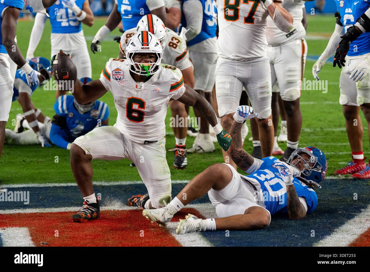 Phoenix, USA. 08th Jan, 2026. Miami RB CharMar Brown (6) celebrates his ...