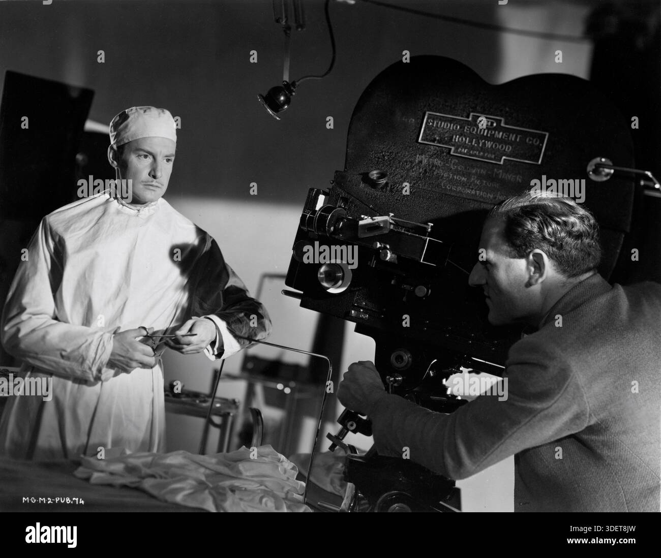ROBERT DONAT on set candid with Camera Operator during filming of THE ...