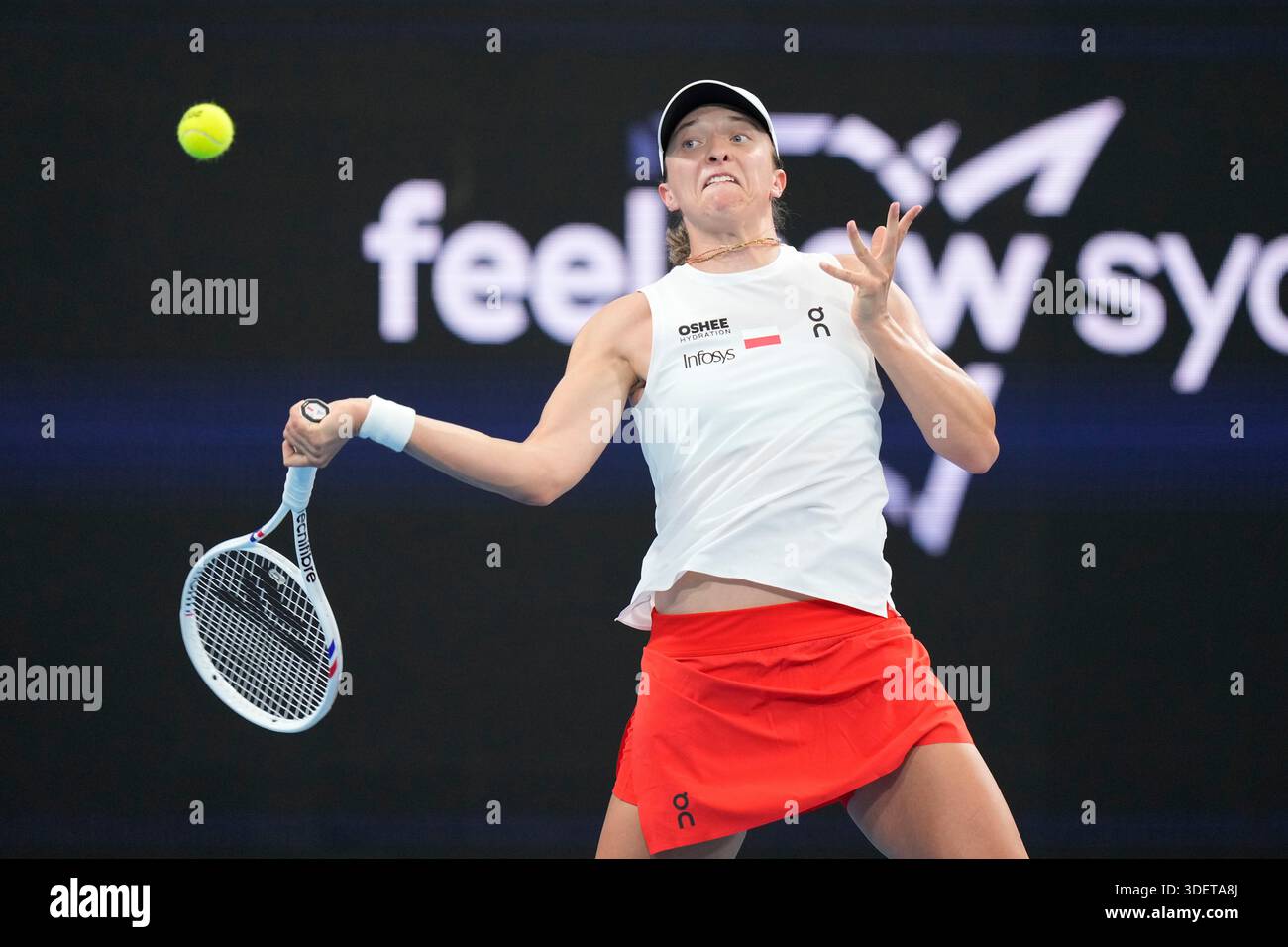 Iga Swiatek of Poland hits a forehand to Maya Joint of Australia during ...
