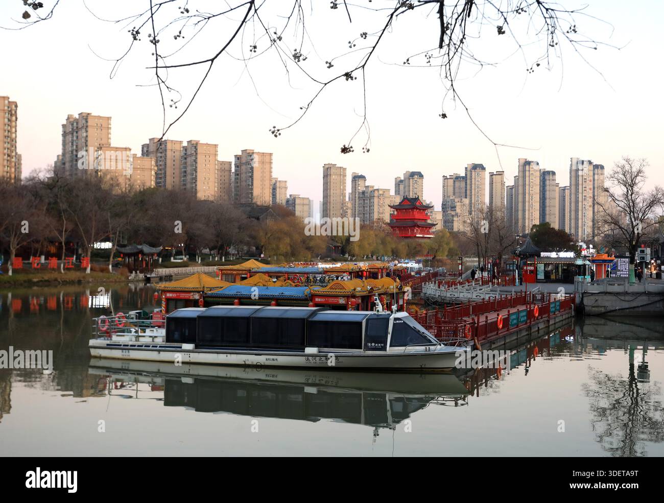Visitors crowd the night market at Li Canal scenic area in Huai'an City ...