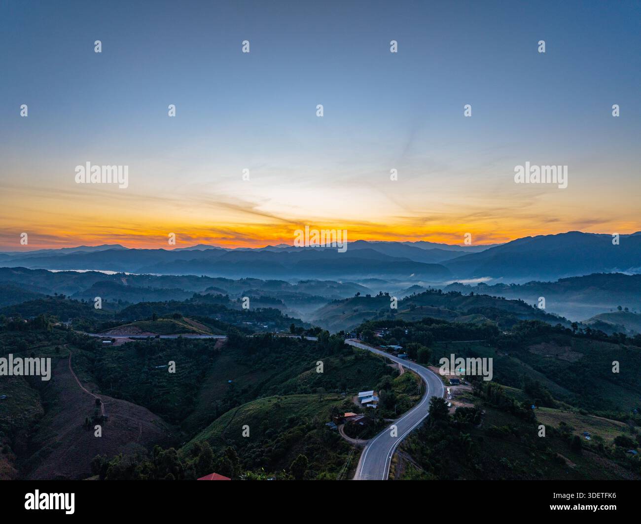 Dawn unfolds sunlight spills over hi-res stock photography and images ...