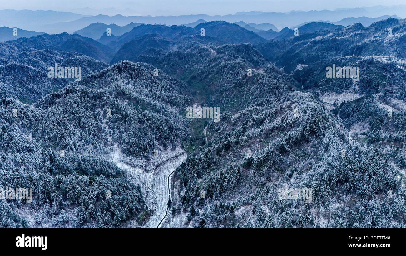 Aerial photo shows the snow-covered landscape in Youyang County ...