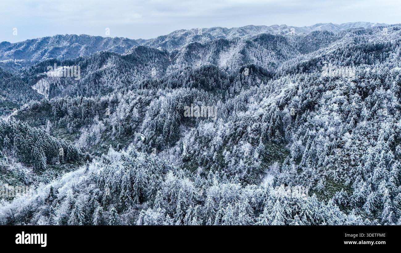 Aerial photo shows the snow-covered landscape in Youyang County ...