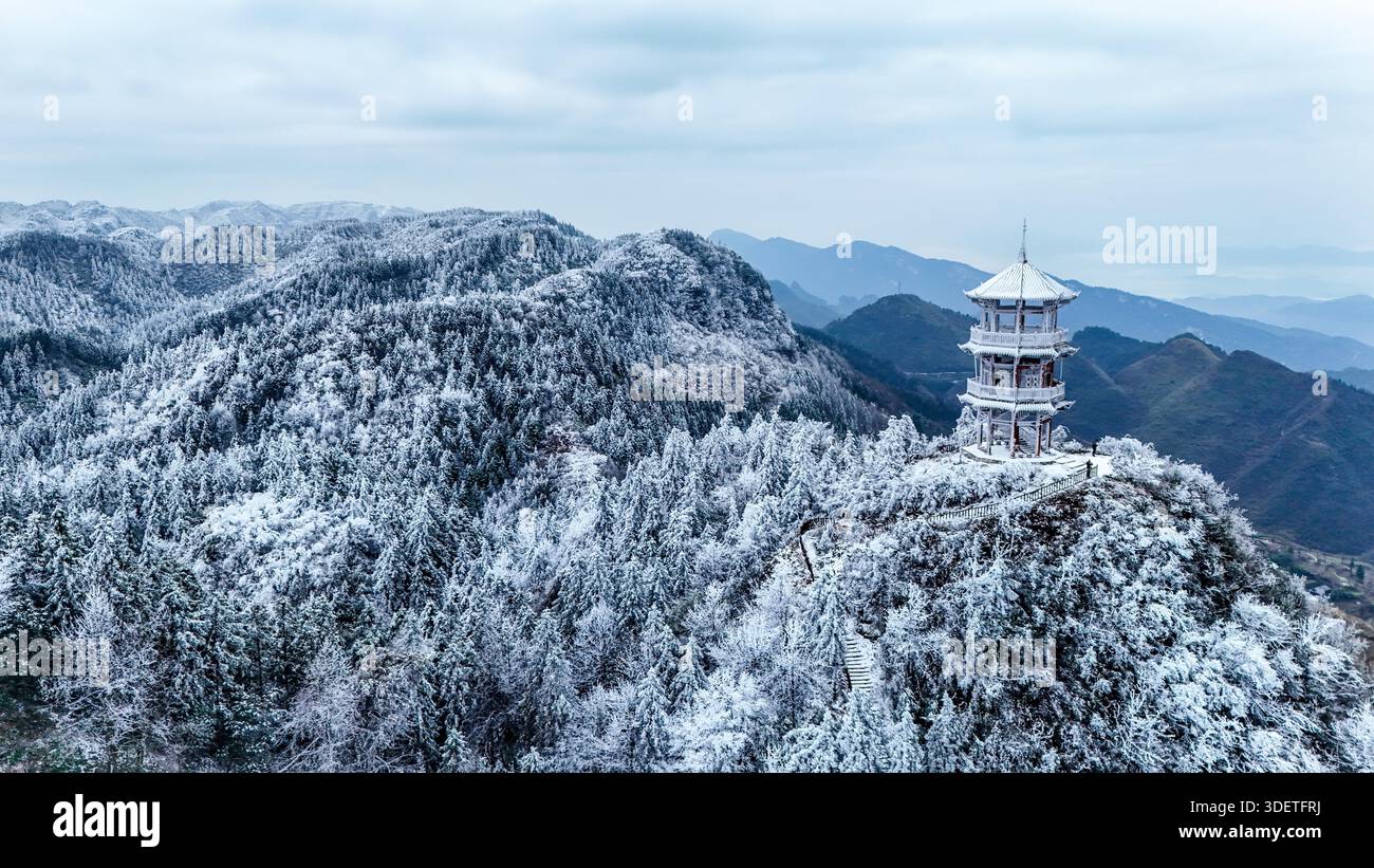 Aerial photo shows the snow-covered landscape in Youyang County ...