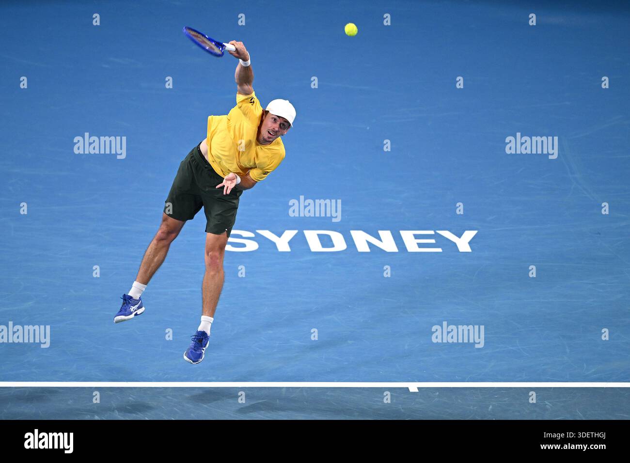 Alex de Minaur of Australia serves during the quarterfinal match ...