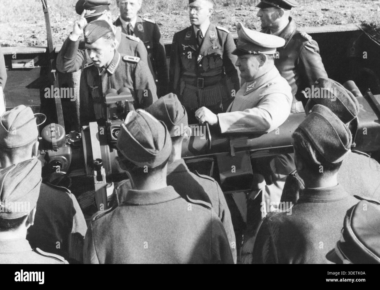 Hermann Göring visiting soldiers of an anti-aircraft battery who are ...