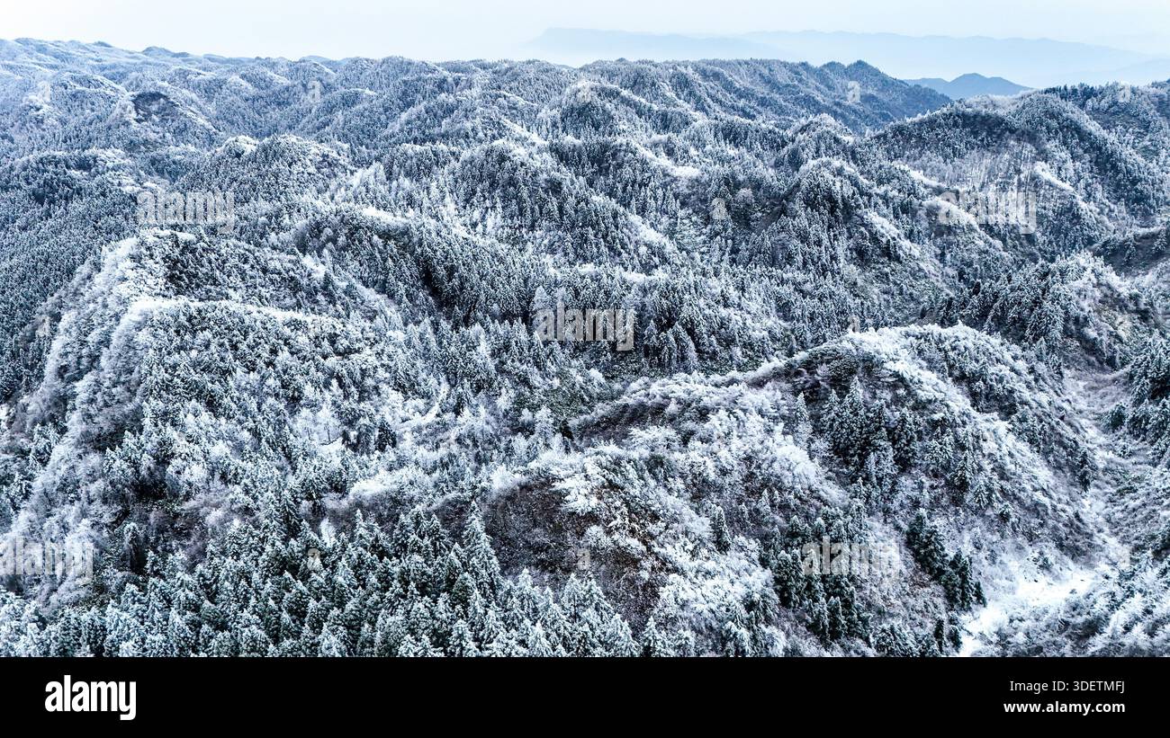 Aerial photo shows the snow-covered landscape in Youyang County ...