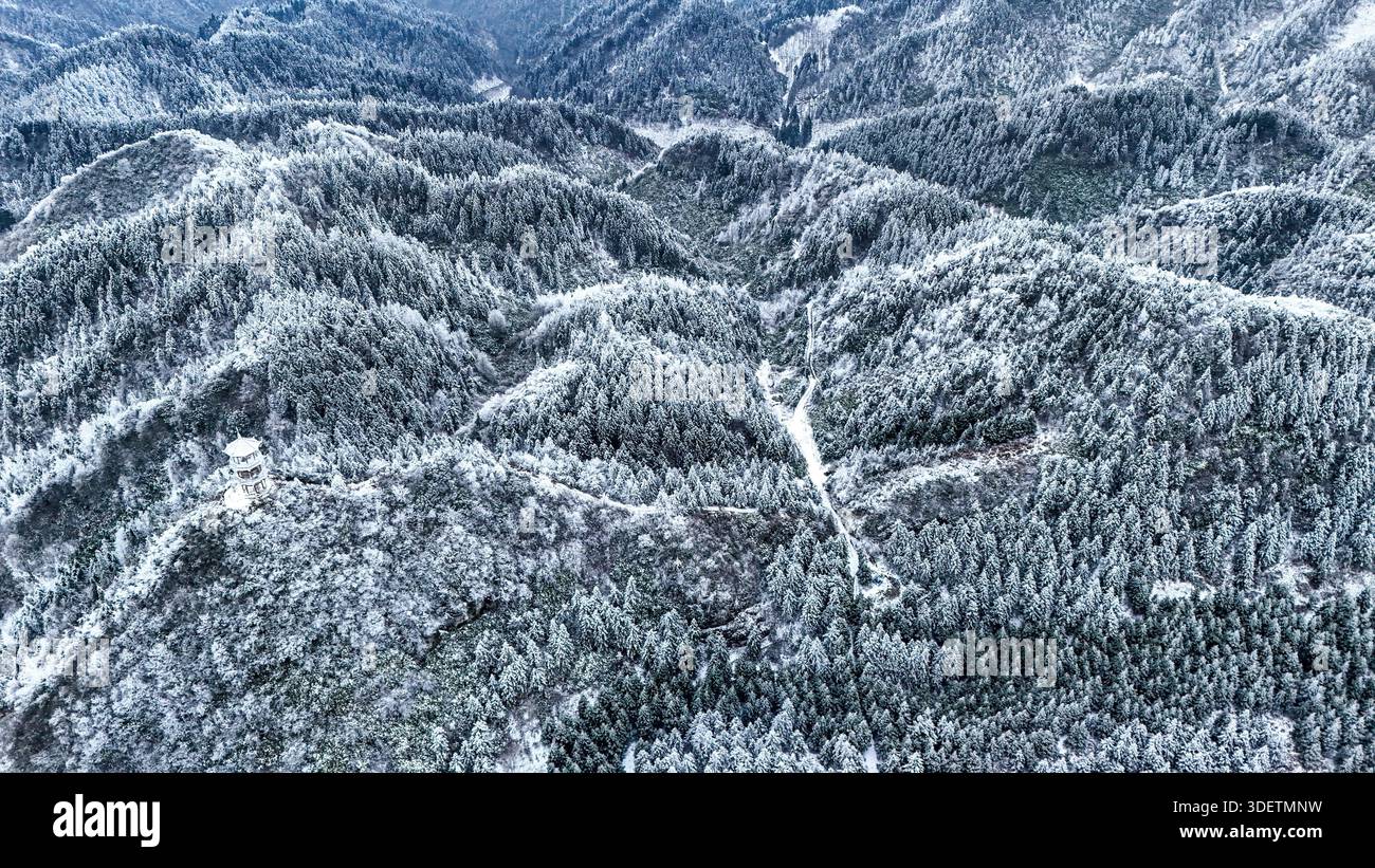 Aerial photo shows the snow-covered landscape in Youyang County ...