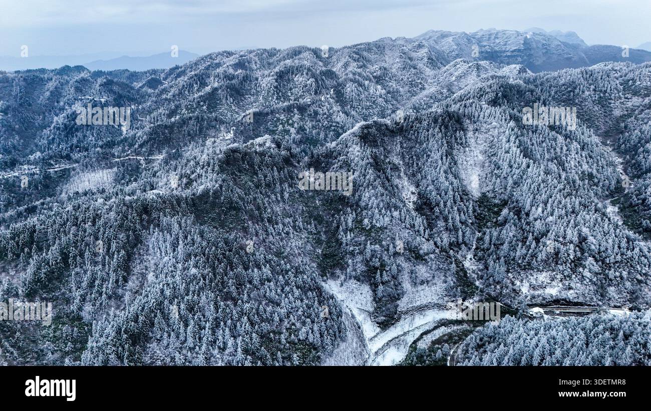 Aerial photo shows the snow-covered landscape in Youyang County ...
