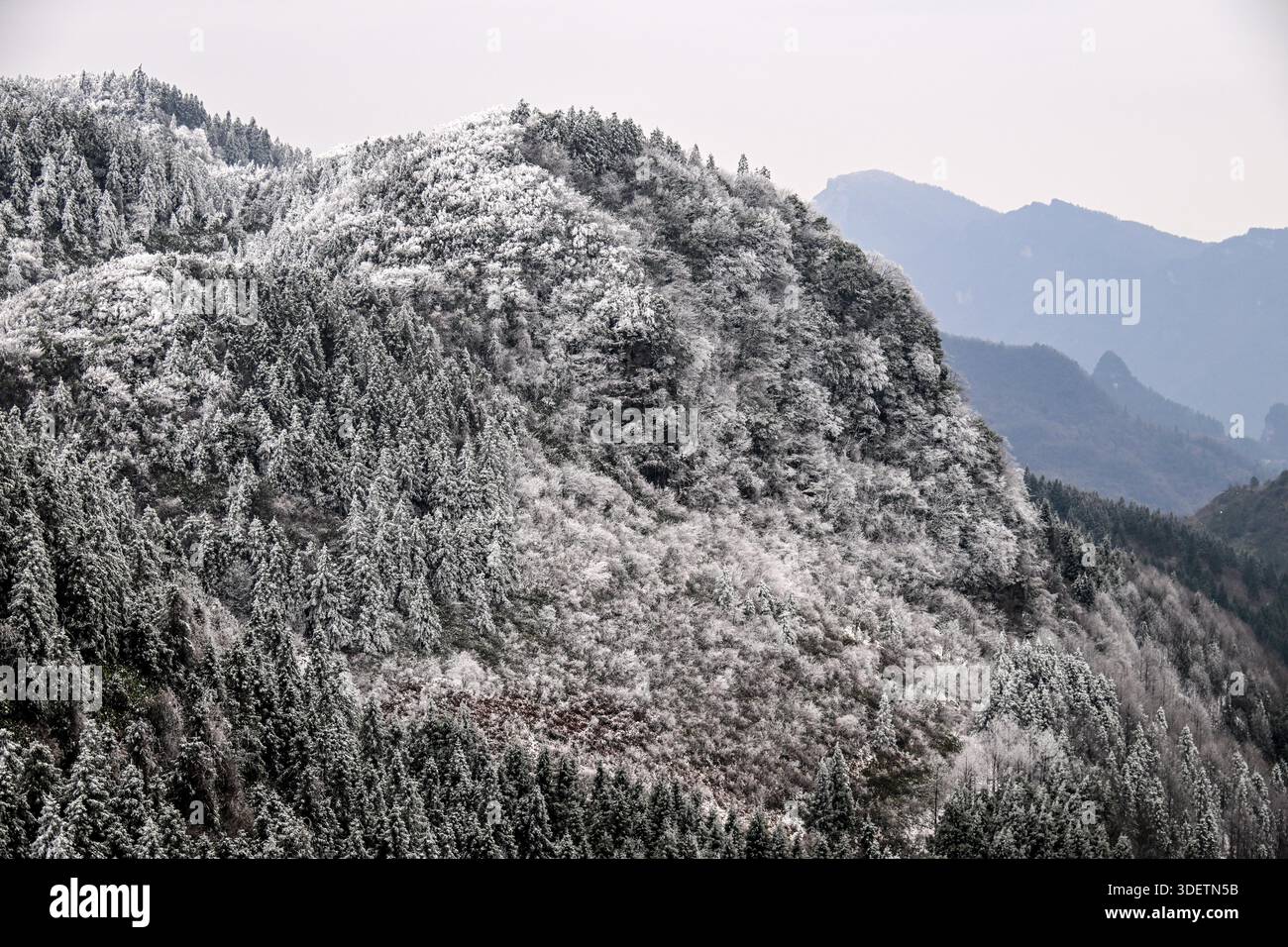 Aerial photo shows the snow-covered landscape in Youyang County ...