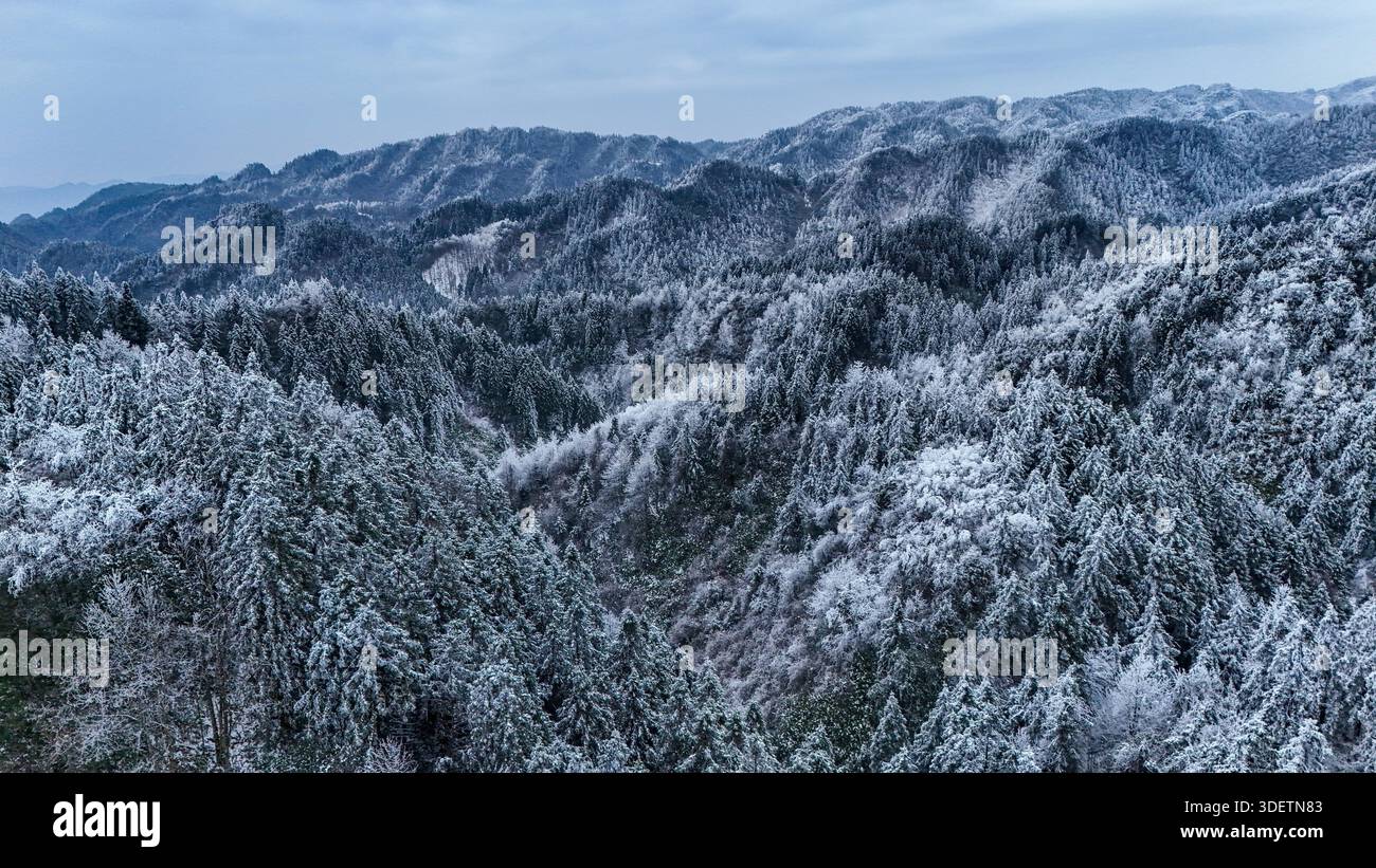 Aerial photo shows the snow-covered landscape in Youyang County ...