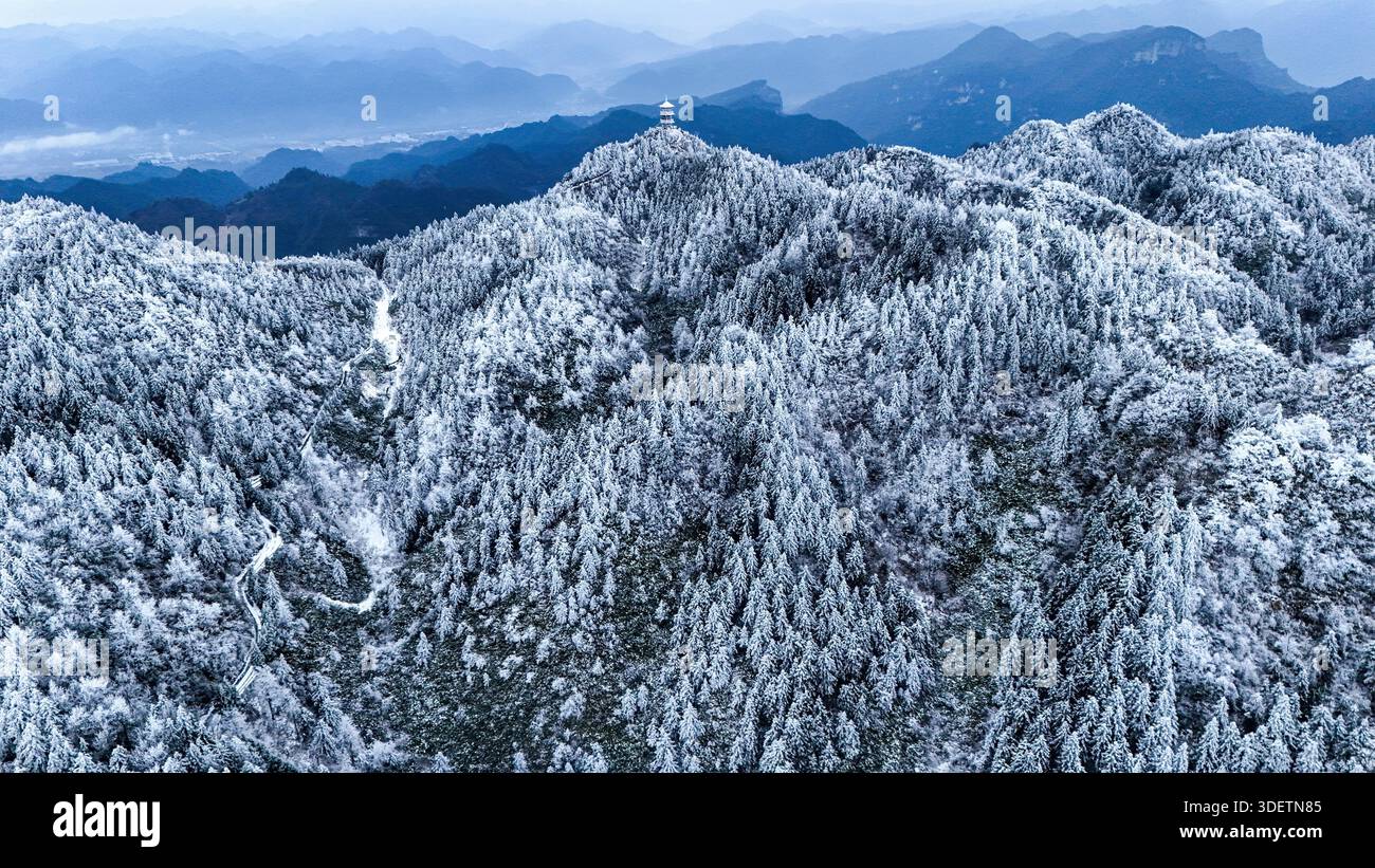 Aerial photo shows the snow-covered landscape in Youyang County ...