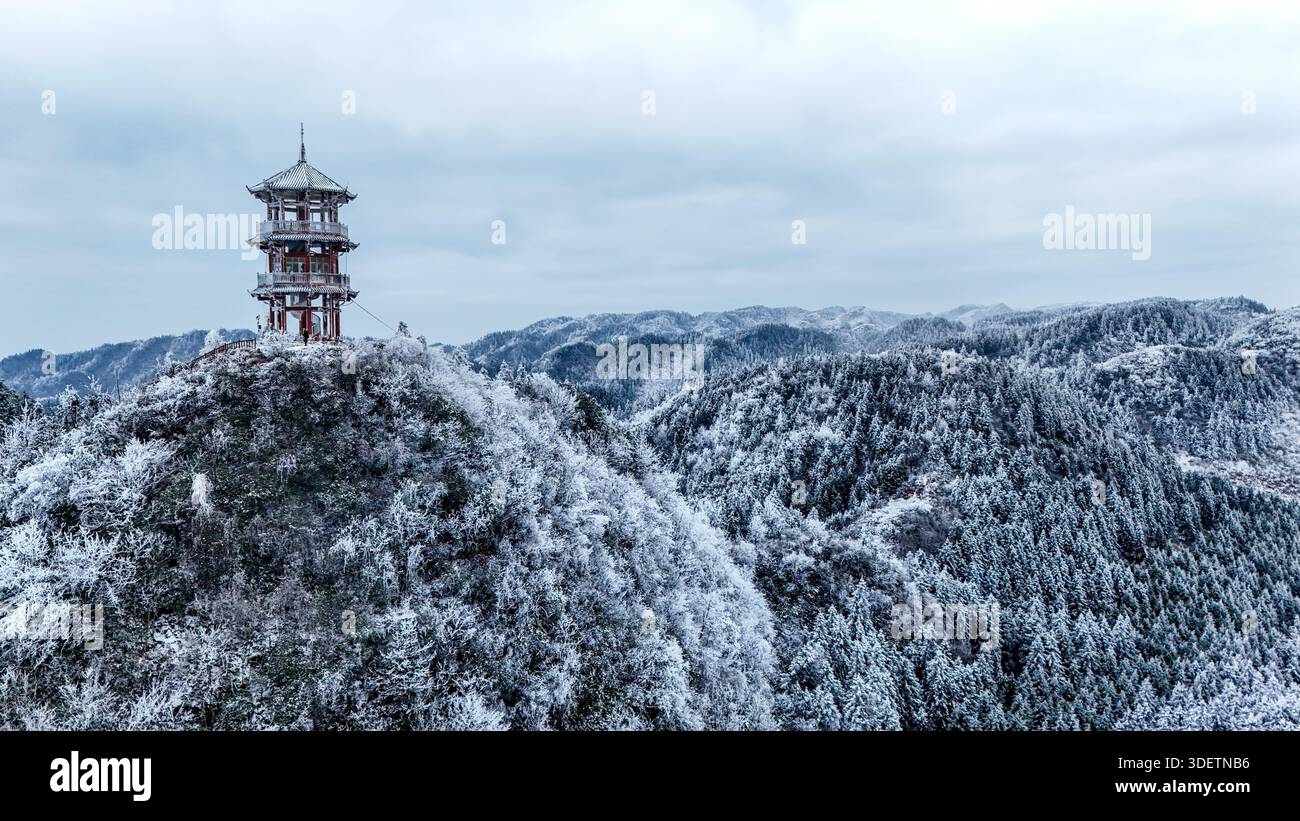 Aerial photo shows the snow-covered landscape in Youyang County ...