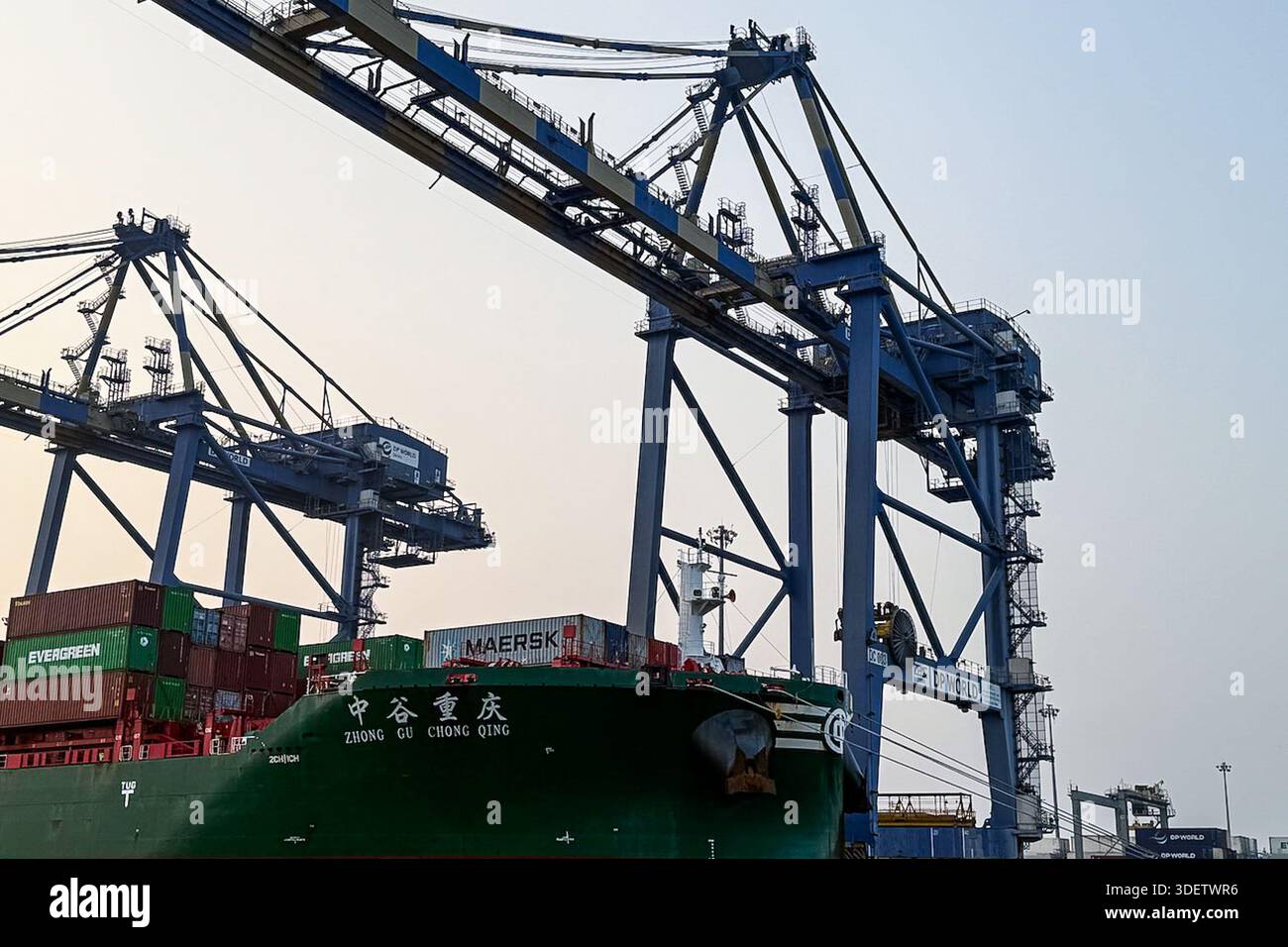 Shipping cranes operate at the Port of Kochi in Kerala, India, on ...