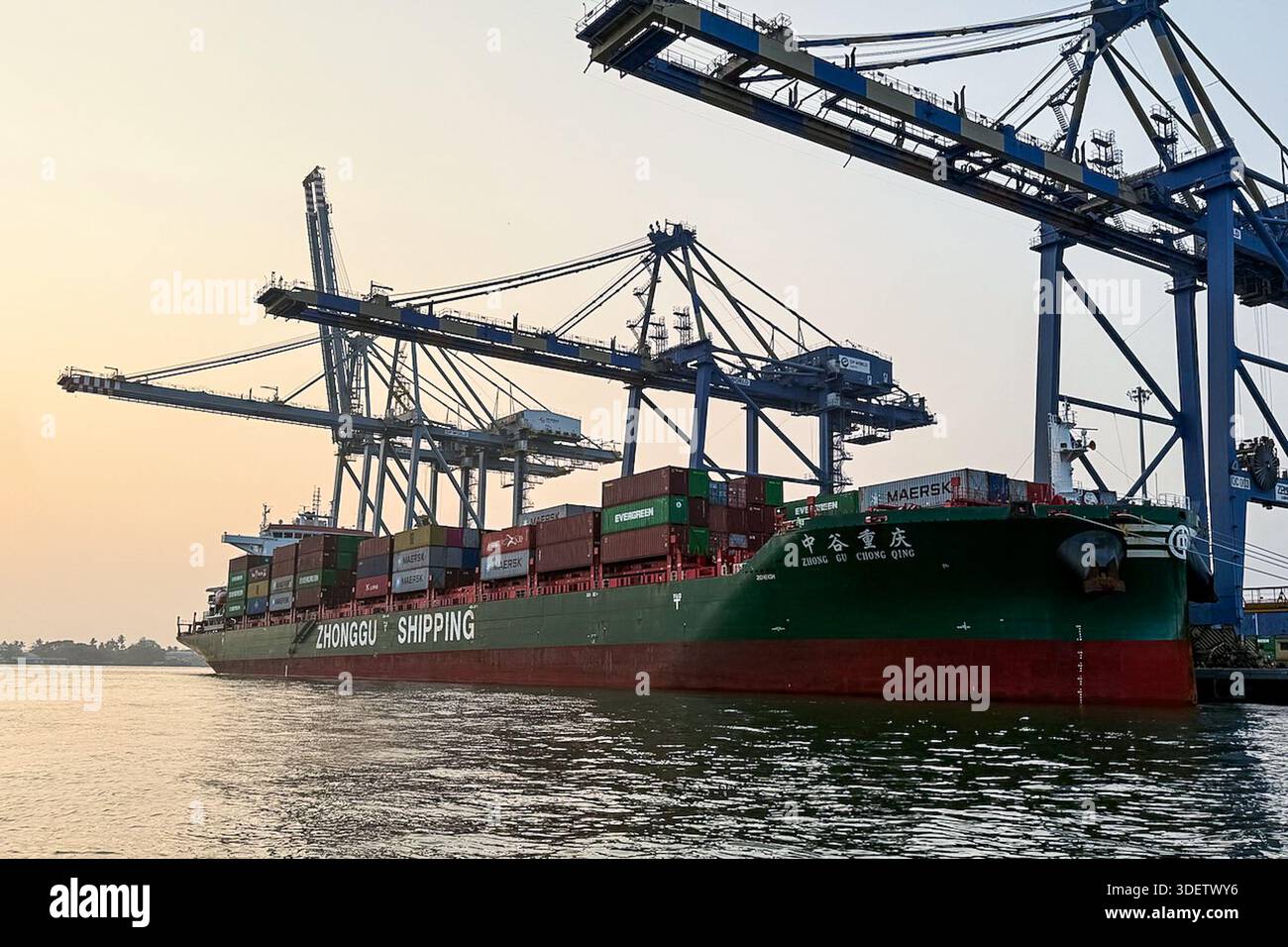 Shipping cranes operate at the Port of Kochi in Kerala, India, on ...