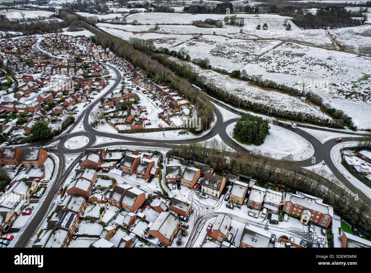 Aerial views of snow covered roundabout near Newport, Shropshire, after ...