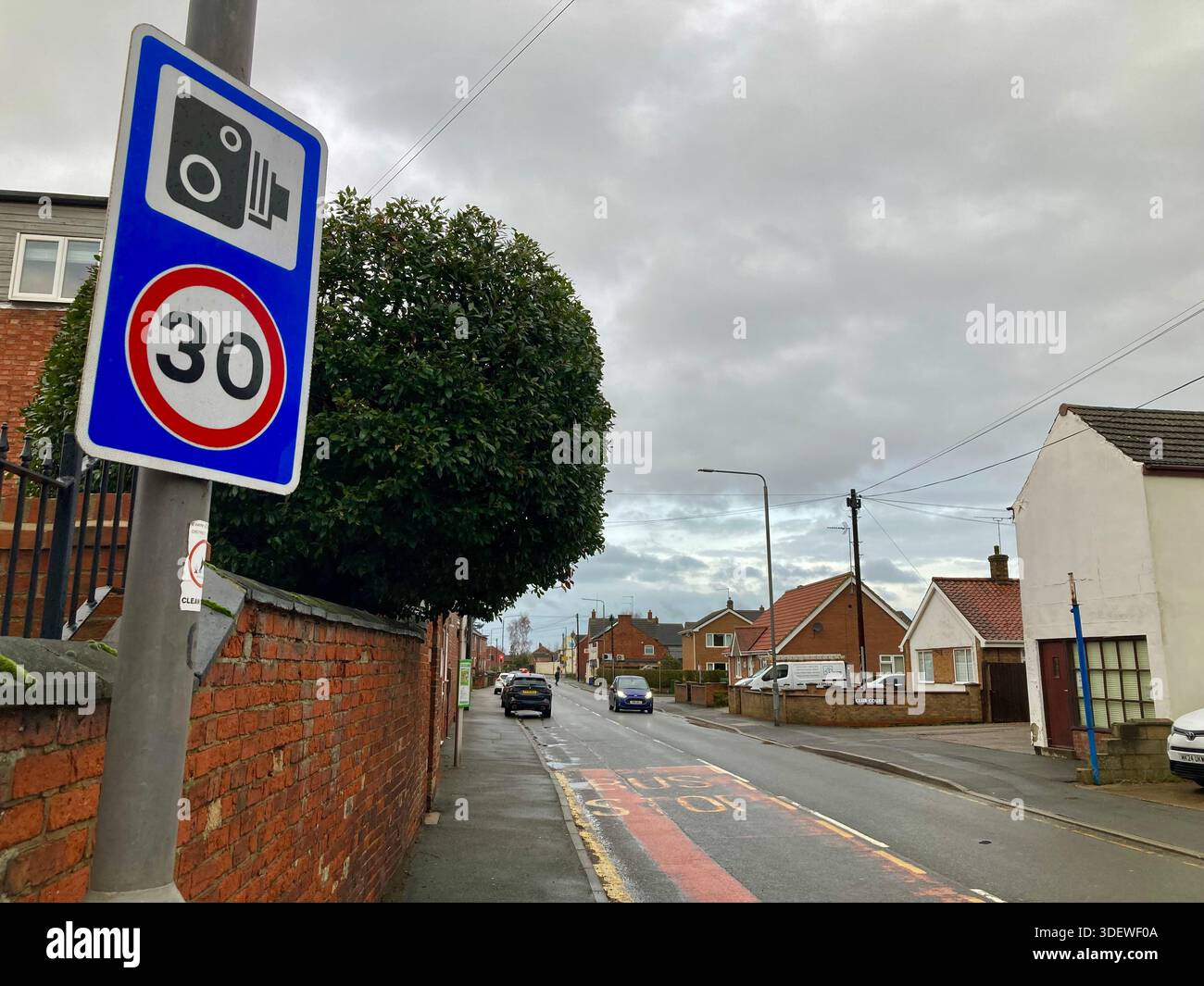 Sign of Slowly 30 MPH and camera symbol warn of speed camera Stock ...
