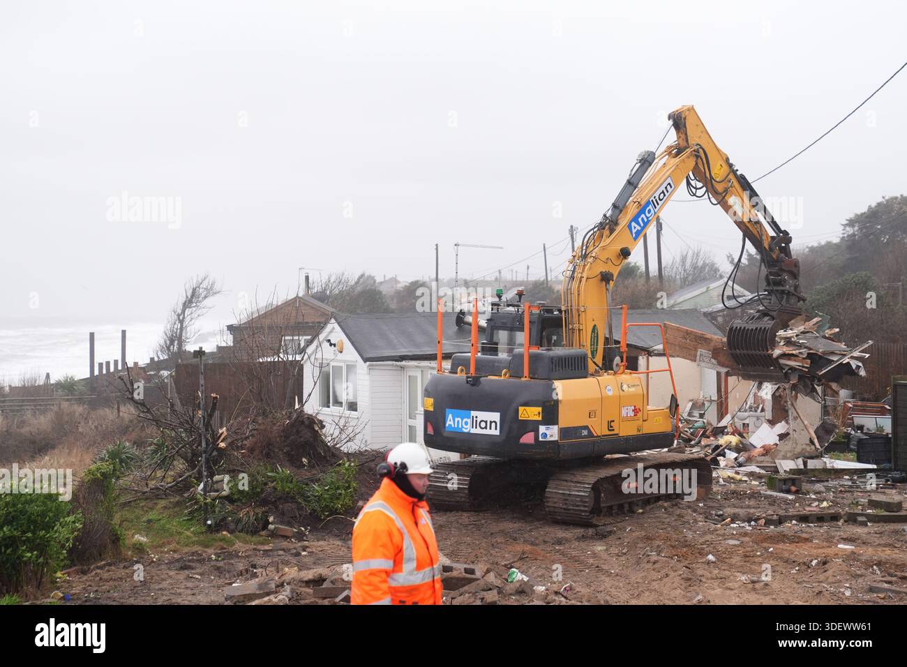 Properties being demolished close to the cliff edge at Hemsby in ...