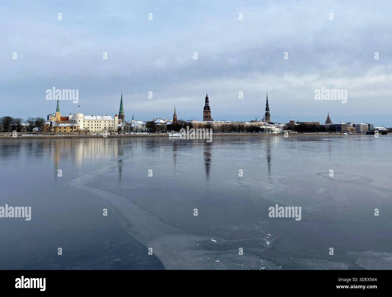 09 January 2026, Latvia, Riga: View of the old town across the partly ...