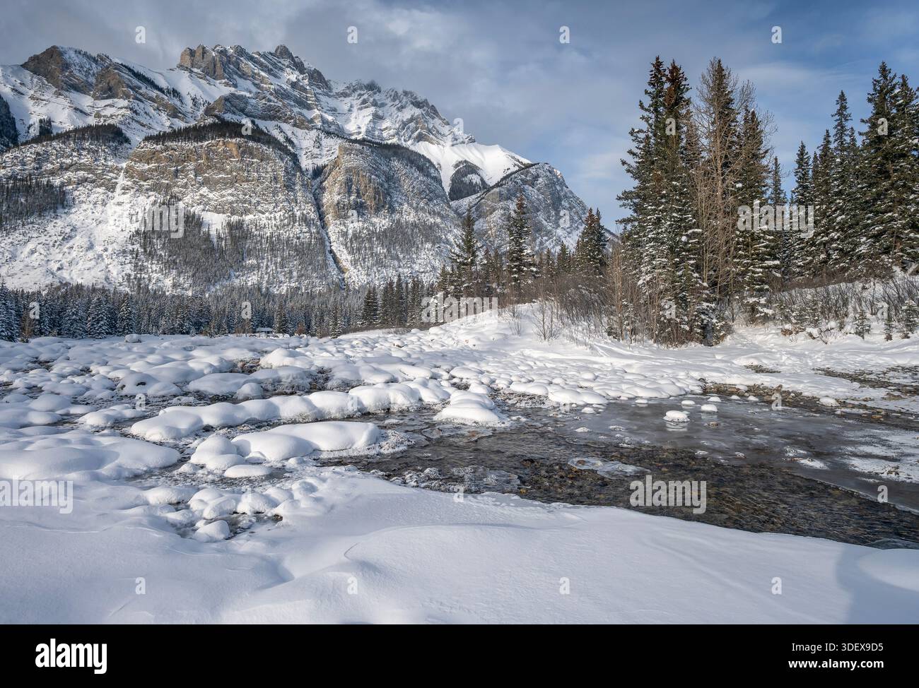 Winter view of snowy Cascade Mountain and Cascade River in Banff ...