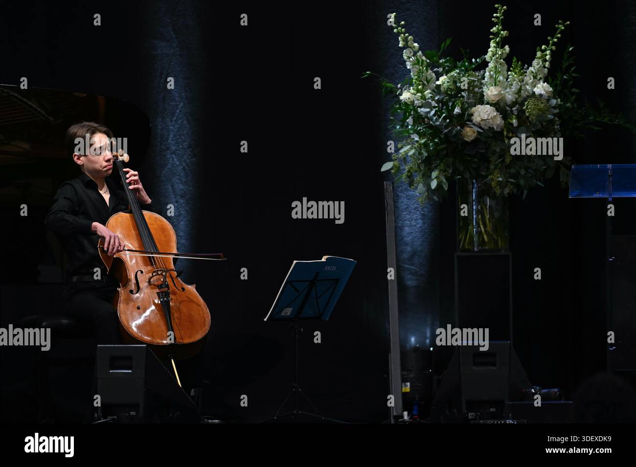 Musician Lyam Chenaux performs during the tribute ceremony for the ...