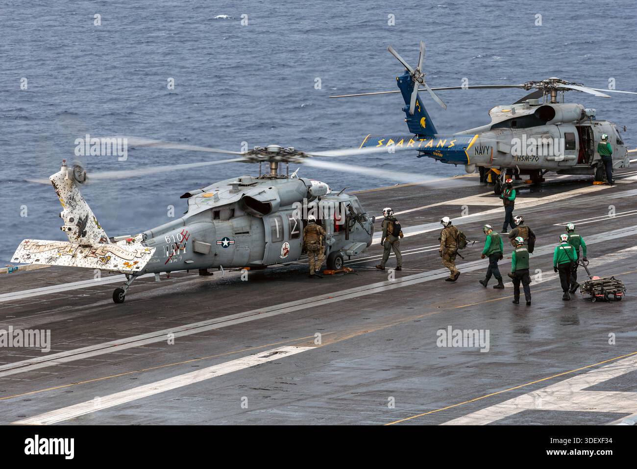 U.S. Coast Guard and Law Enforcement Tactical Team members, Sailors ...