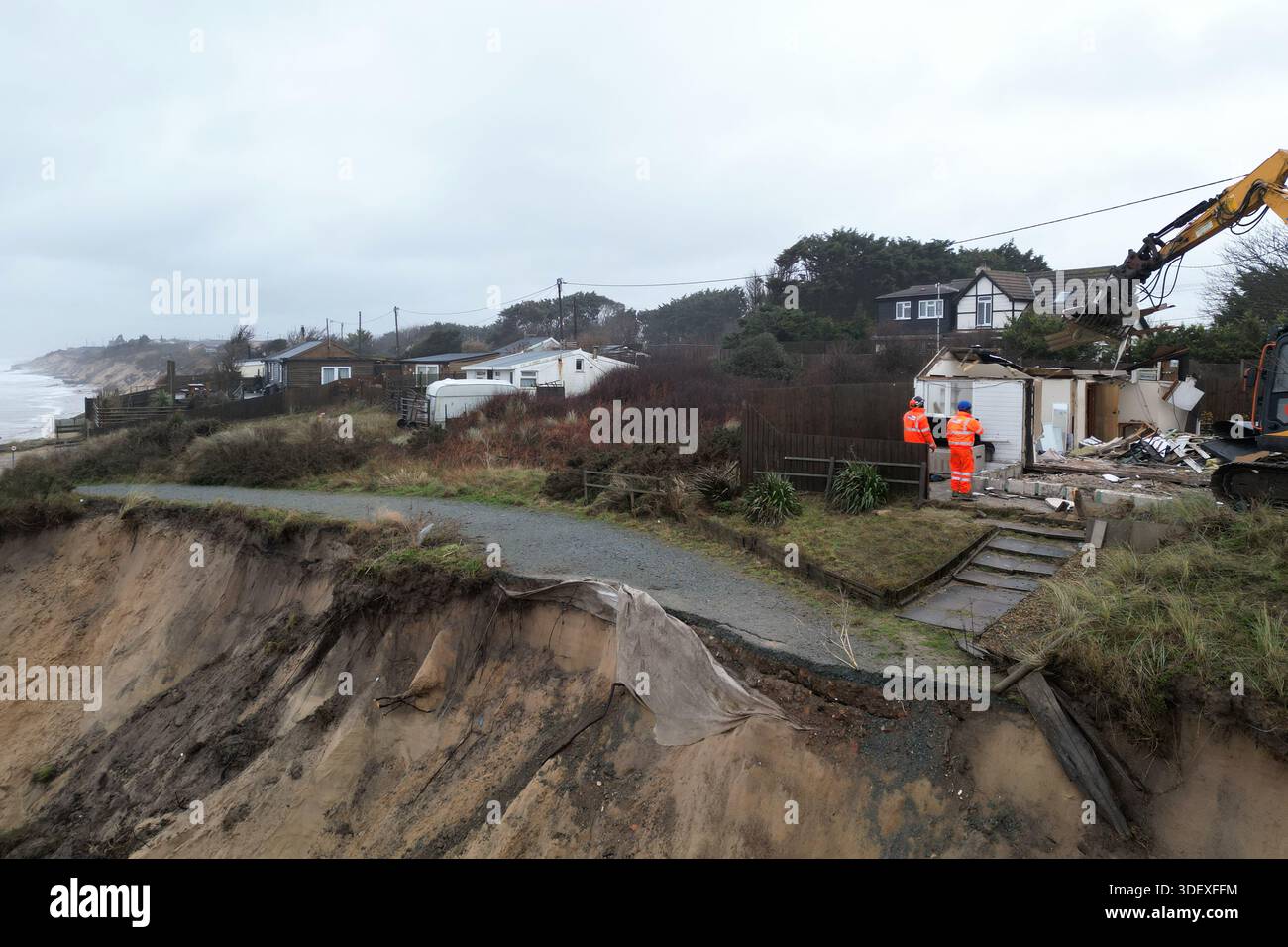 Properties being demolished close to the cliff edge at Hemsby in ...