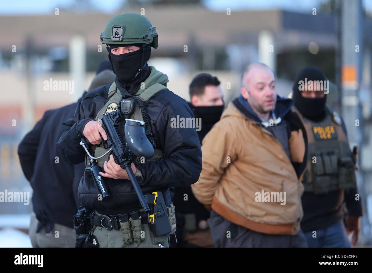 Protesters are arrested by federal agents outside the Bishop Henry ...